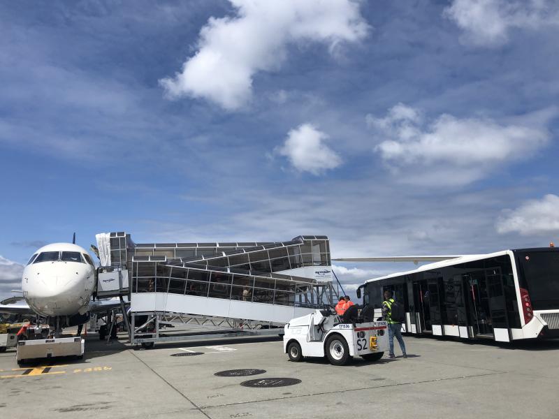 Boarding A Plane In Airport
